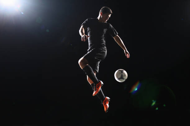 Football player jumping with ball on, Stanislaw Pytel | Posterji, Slike ...